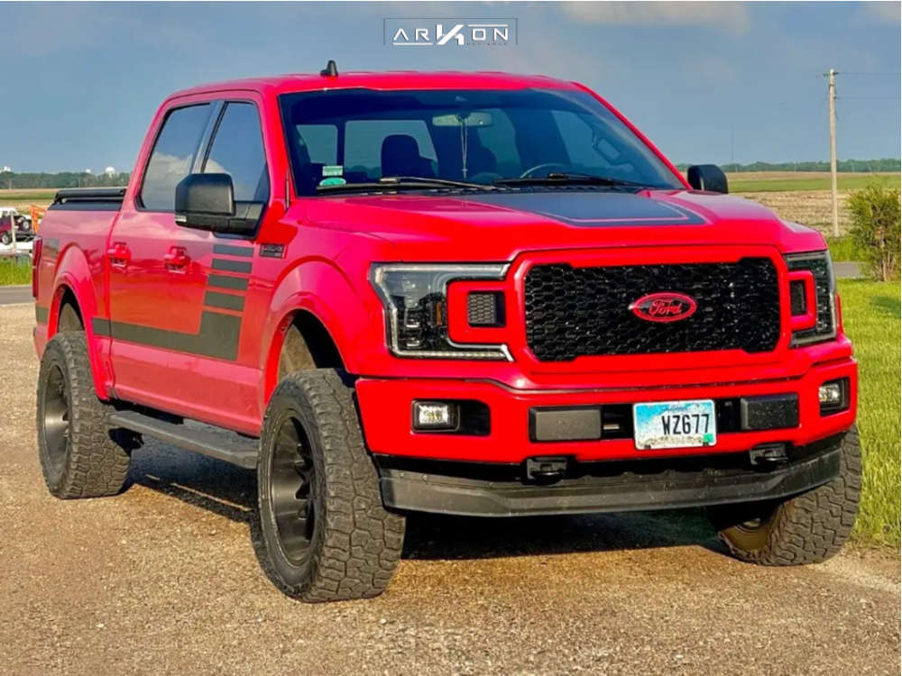 Red Ford Raptor Lifted